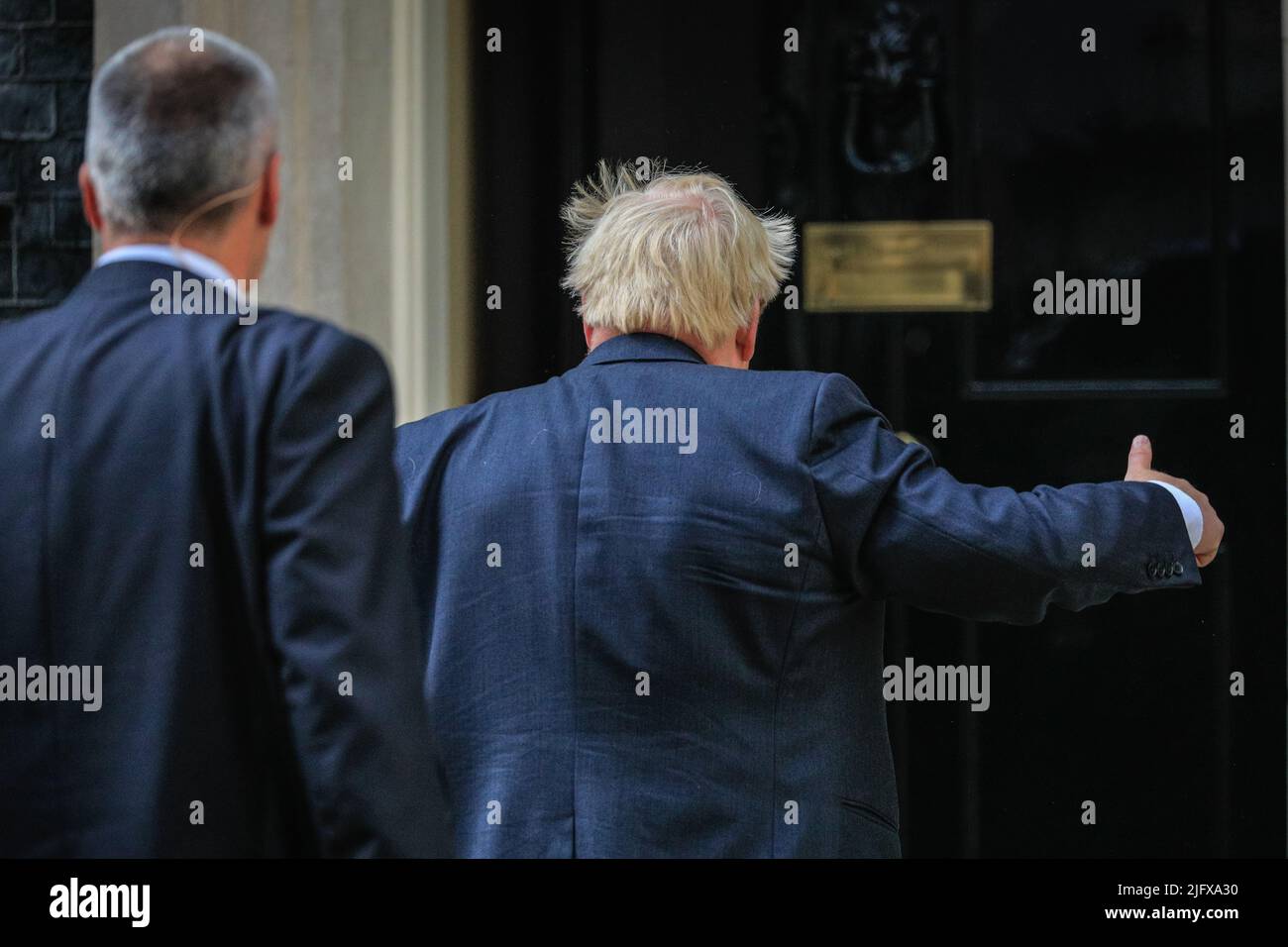London, UK. 05th July, 2022. Boris Johnson appears to defiantly hold up ...