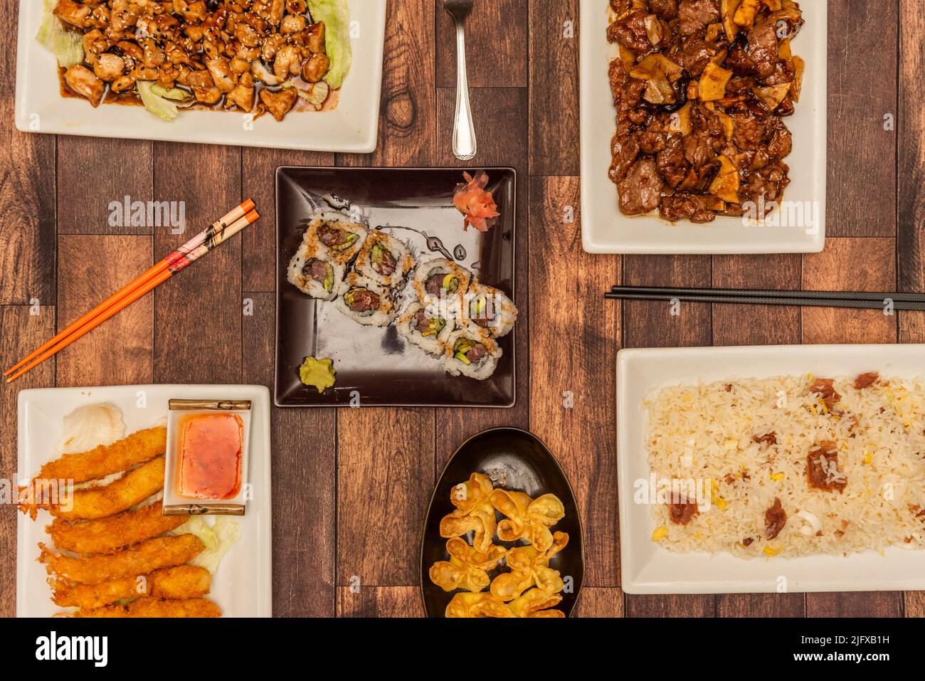 Set of oriental food dishes with panko battered shrimp, fried wonton ...