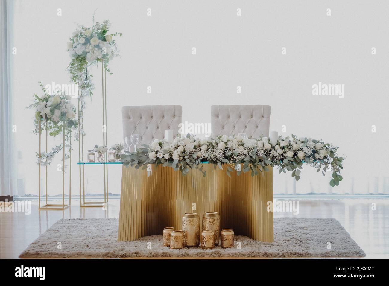 The seats of the bride and the groom at a reception hall Stock Photo ...
