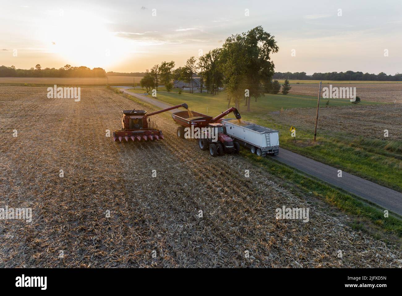 Grain harvest unloading sunset hi-res stock photography and images - Alamy