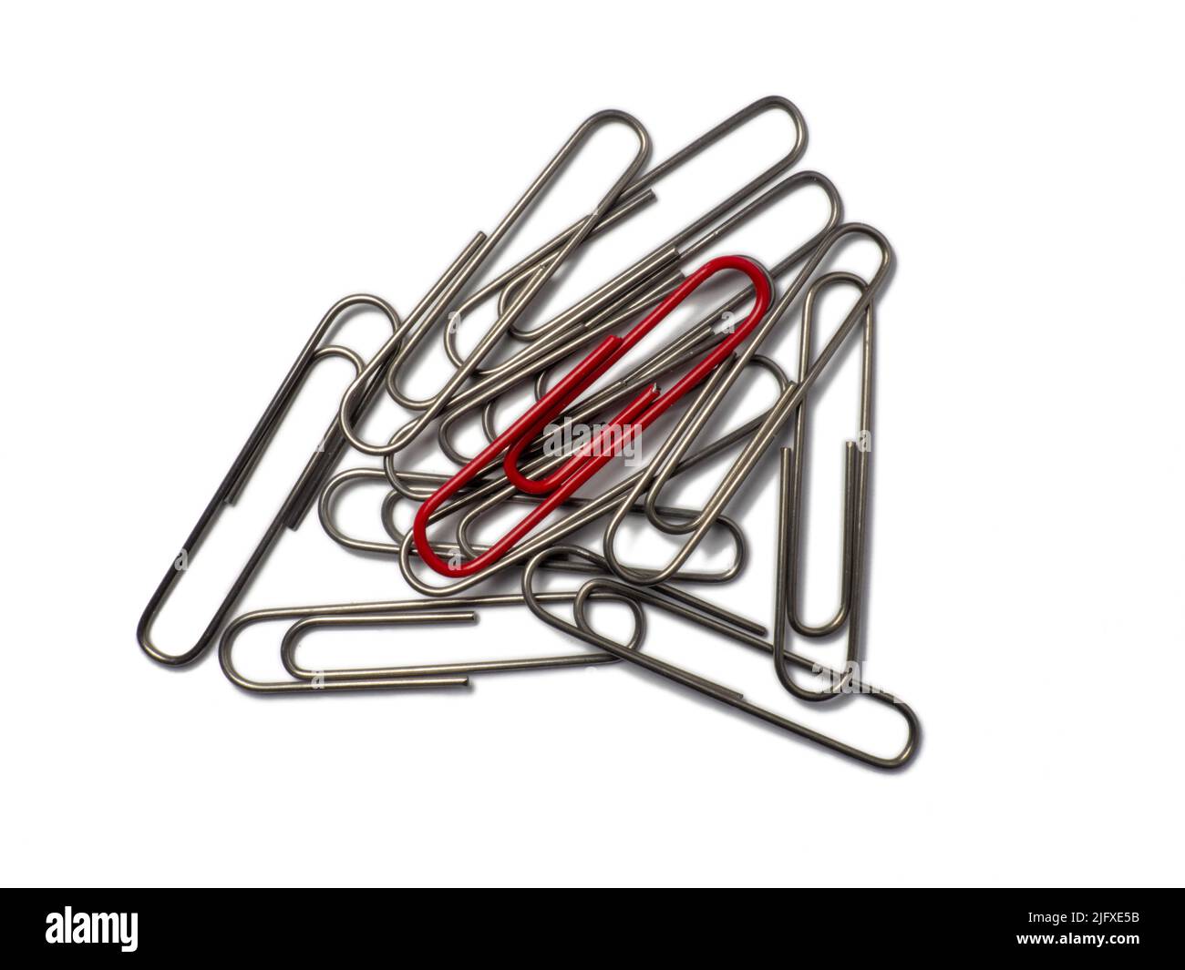 Metal paper clips on a white background. Office supplies isolate. Idea ...