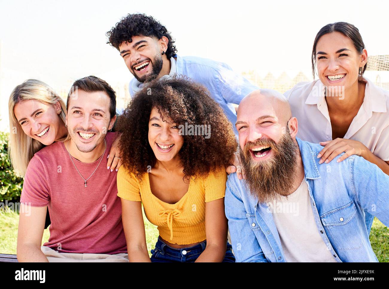 Cheerful Group of friends posing for a photo and having fun. Friendship ...