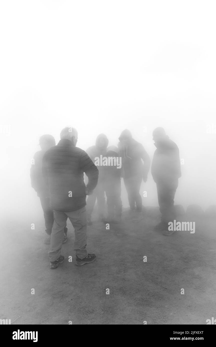 group of people together in heavy fog Stock Photo - Alamy