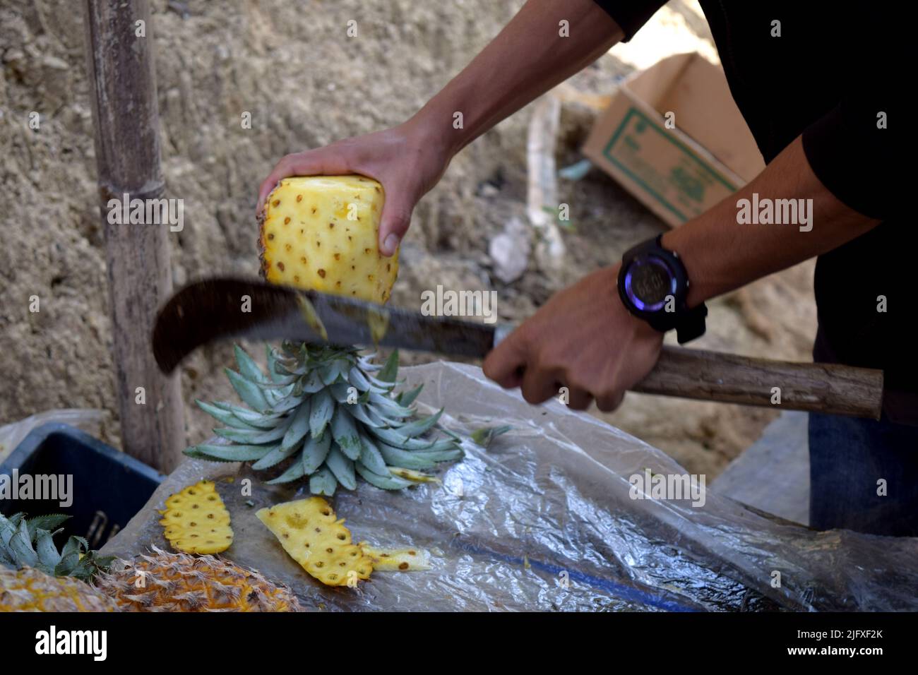Cutting the pineapple with a sharp knife. Healthy Fruit for human ...