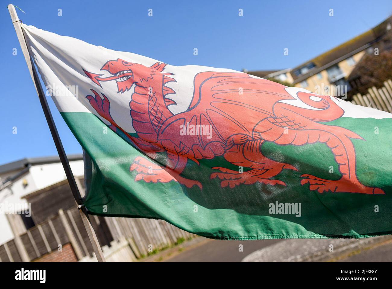 Welsh flag flying in wind Stock Photo - Alamy