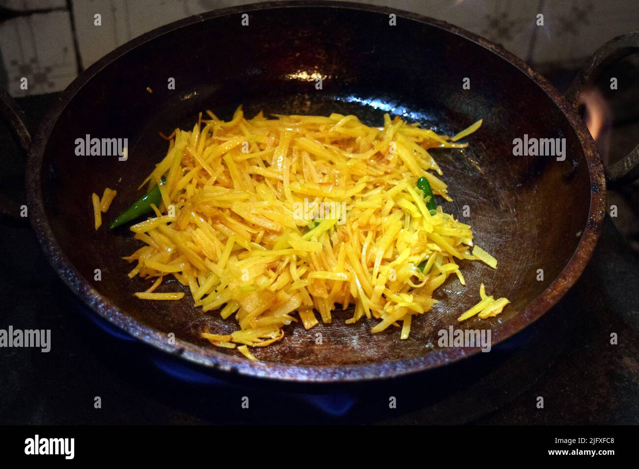 Potato fries on pot. Potato ready for eating with meal Stock Photo - Alamy