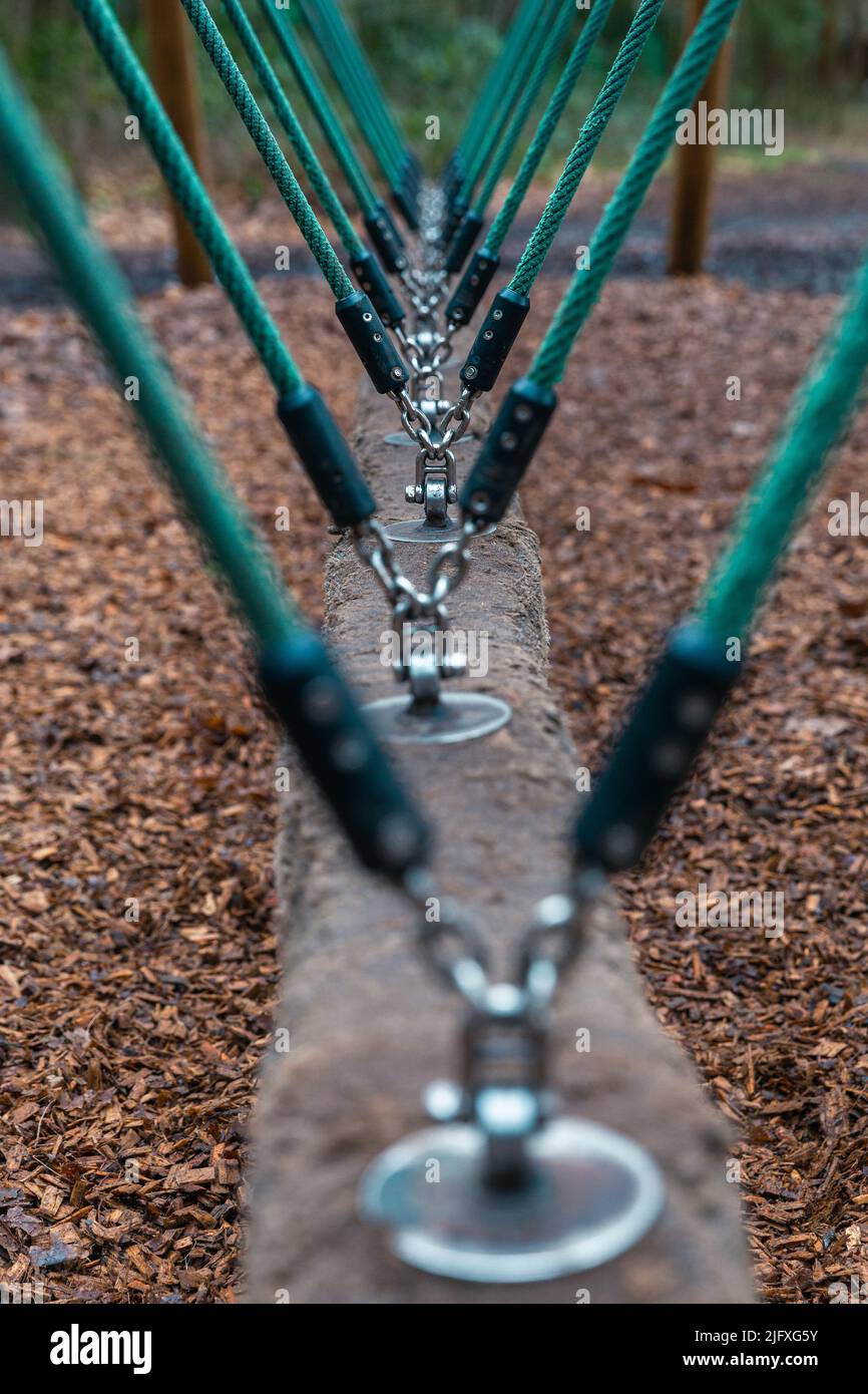 A hawser style horizontal rope swing at a childrens play park Stock ...