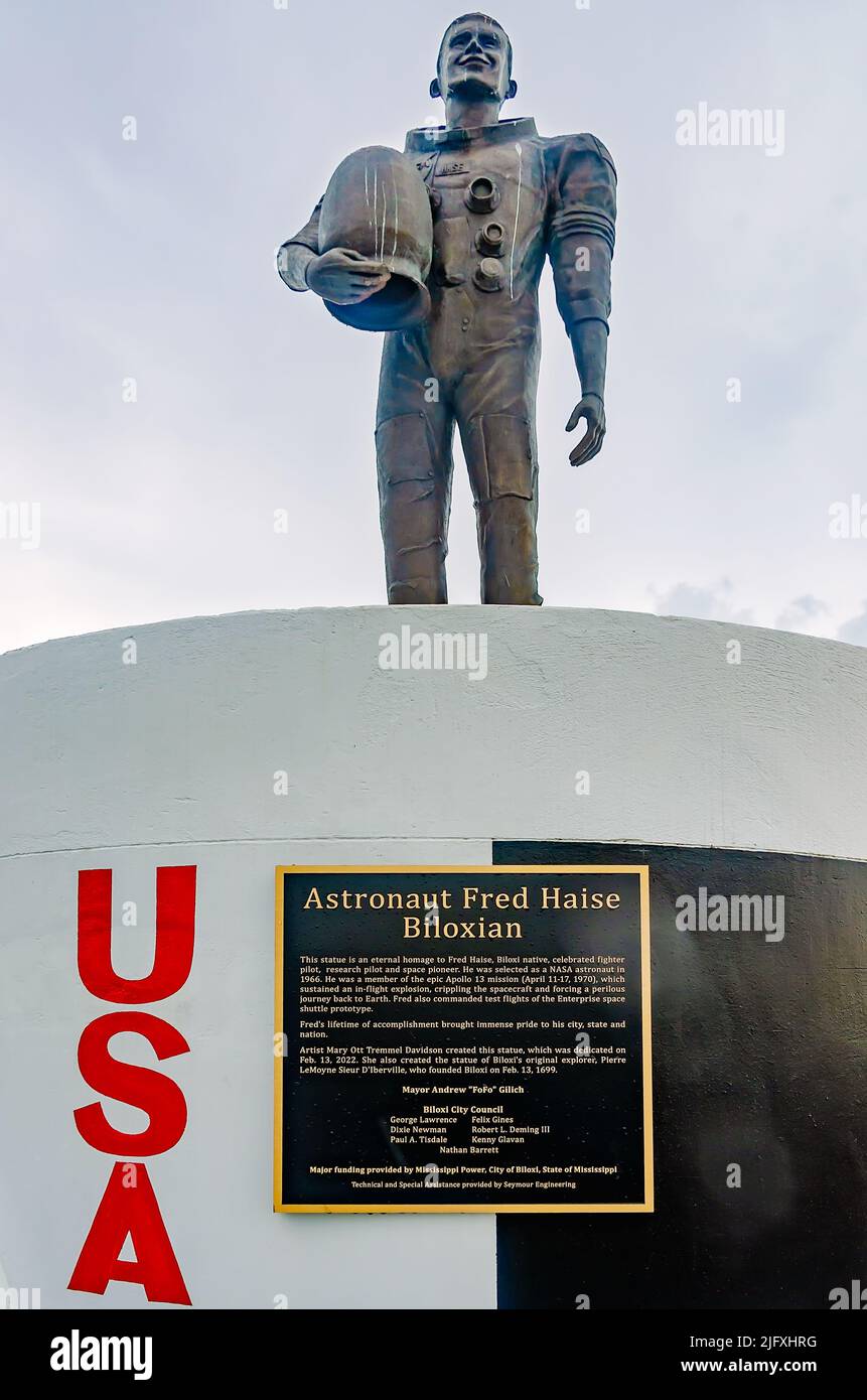 A statue of Apollo 13 astronaut Fred Haise faces the Biloxi Lighthouse ...