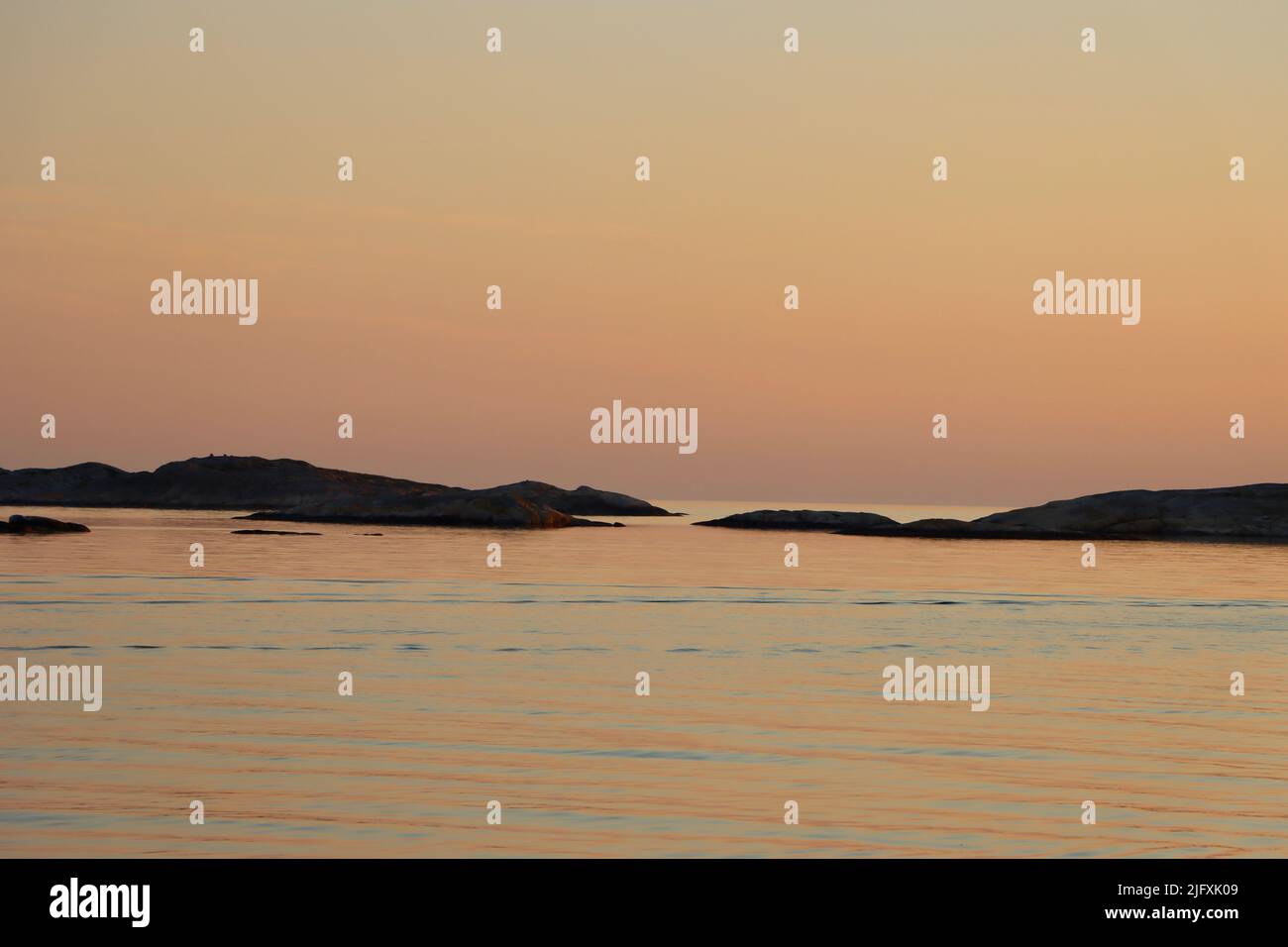 Late evening after sunset in Fjällbacka archipelago during Midsummer ...