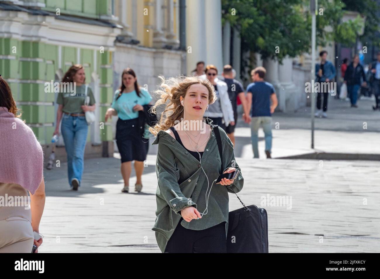 Russia, Moscow. The young girl on one of city streets Stock Photo - Alamy