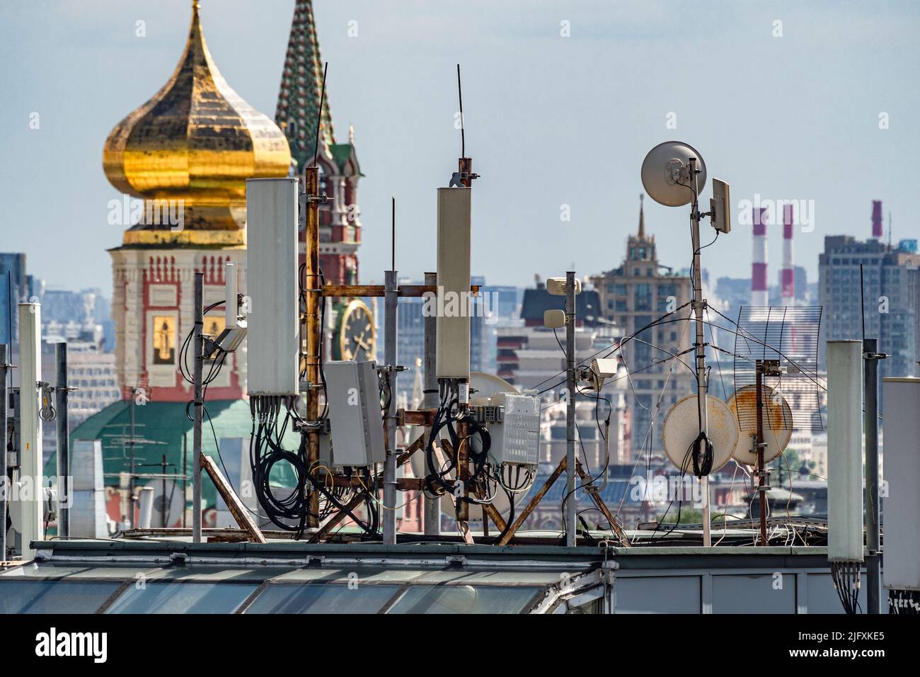 Russia, Moscow. Towers of cellular communication on the rooftop Stock ...