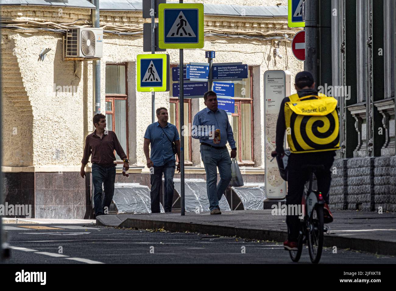 Russia, Moscow. Courier of delivery service Yandex. Food Stock Photo ...