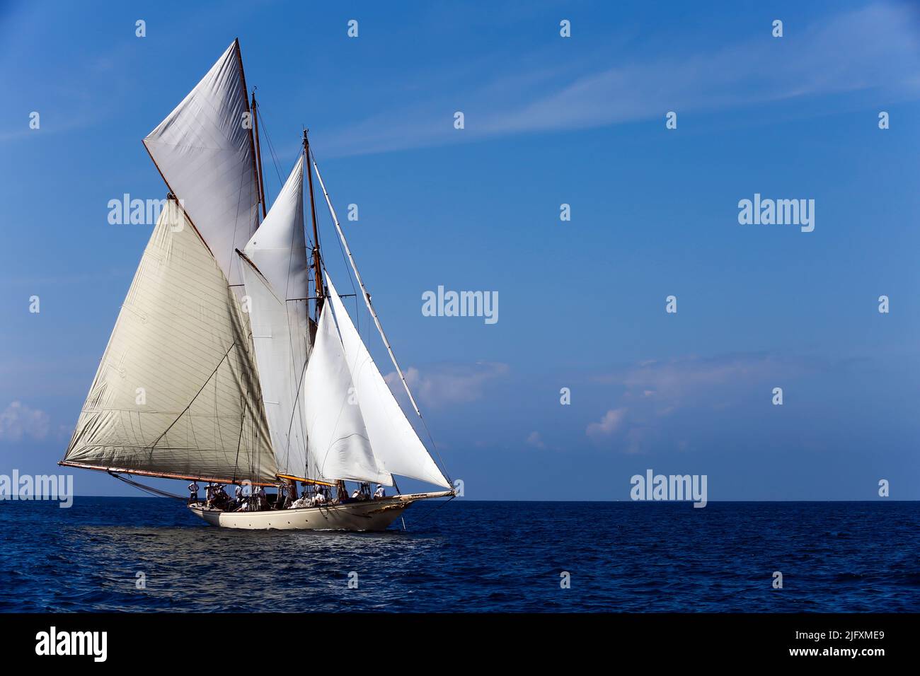 Schooner sailing ship with horizon over water Stock Photo - Alamy