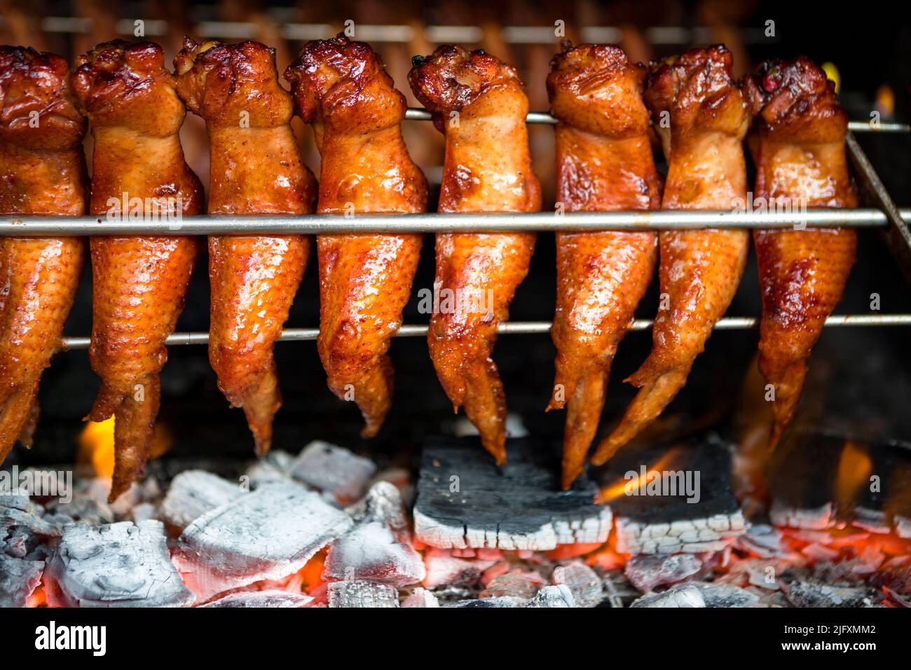 Grilled chicken wings at a street market stall in Jalan Alor, Kuala ...