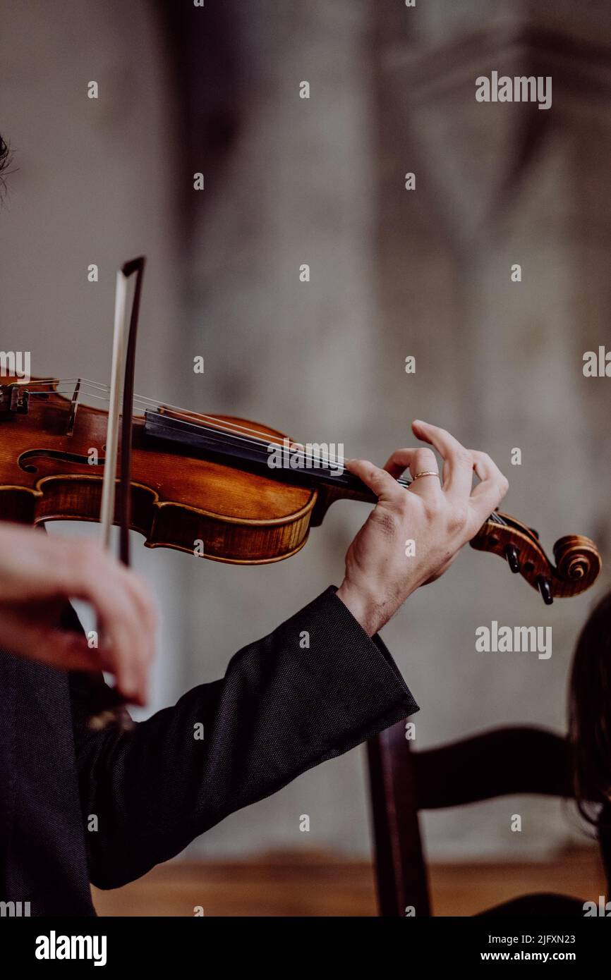 Male playing a violin hi-res stock photography and images - Alamy