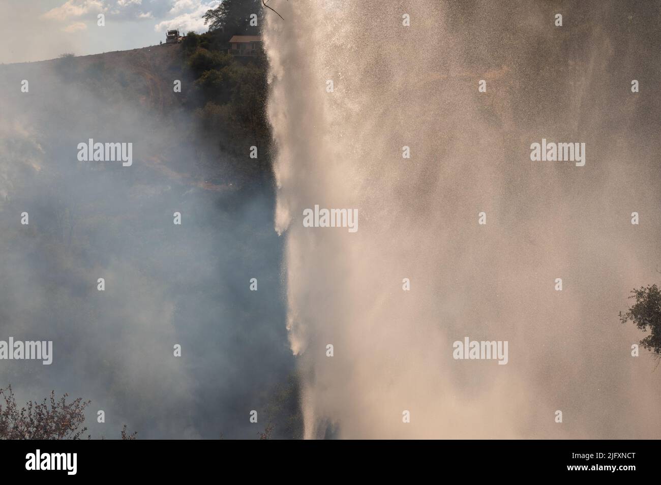 Pine Grove, CA, USA. 5th July, 2022. Helicoptors drop water on the ...