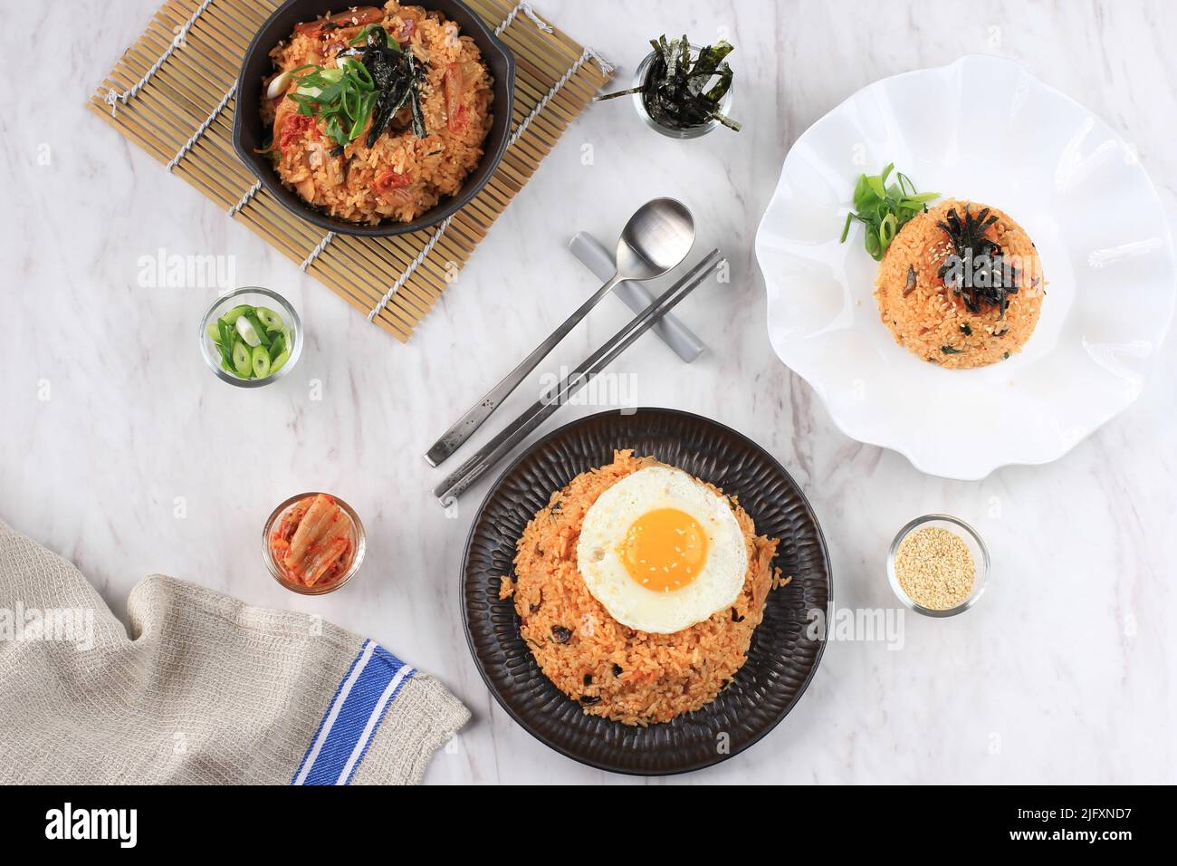 Korean Food, Kimchi Fried Rice Bokkeumbap with Fried Egg in Eating with ...