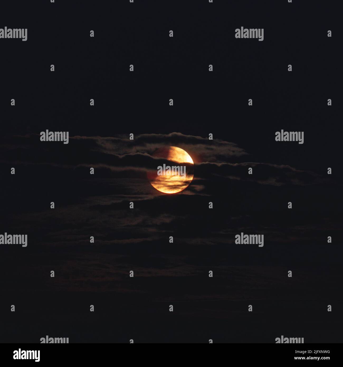 Large full moon with clouds hi-res stock photography and images - Alamy