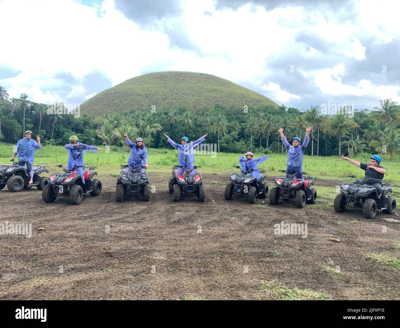 A group of people posing on quad bikes during Summer ATV Adventure at ...