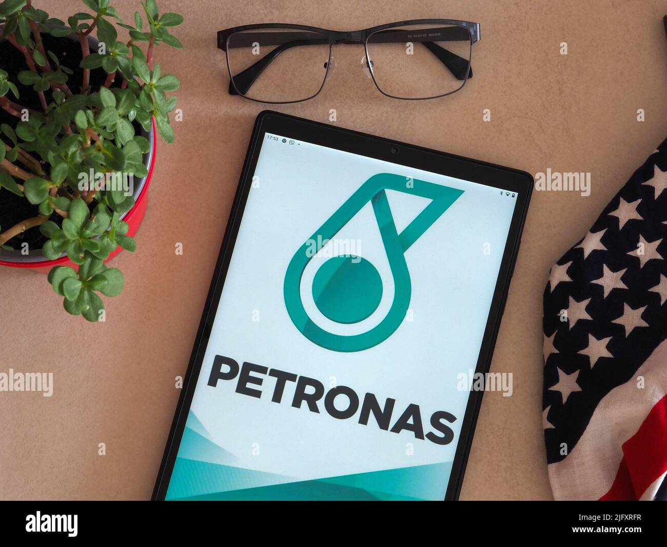 In this photo illustration, Petroliam Nasional Berhad (PETRONAS) logo ...