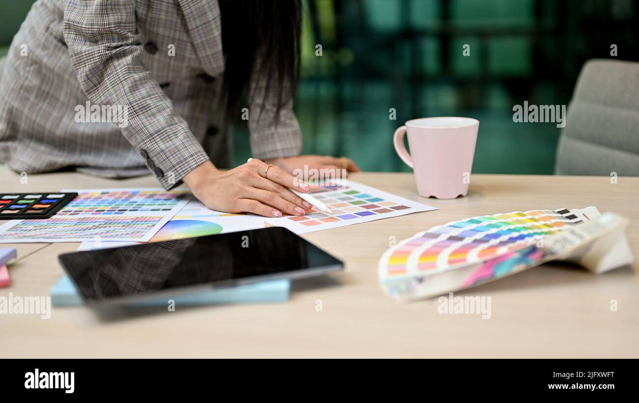 A professional female graphic design or web developer looking the ...