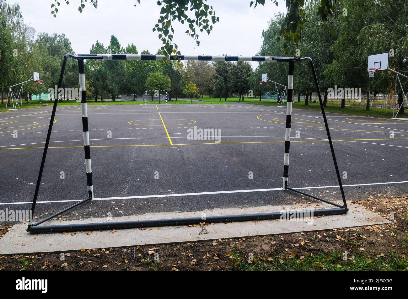An aerial view of rubber flooring sport court surrounded by trees Stock ...