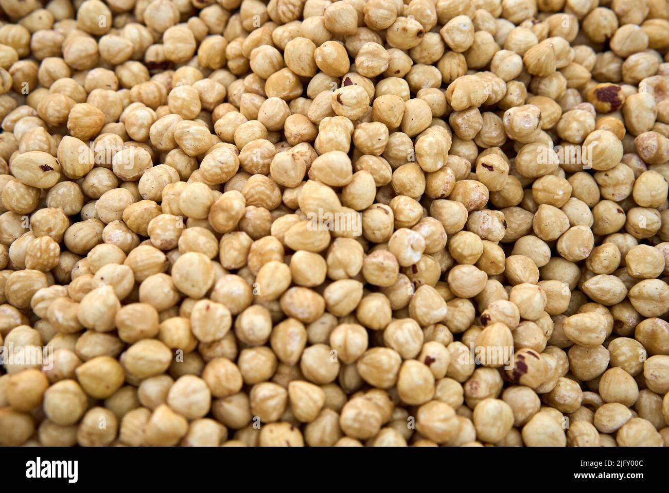 Hazelnut Background. Heap of peeled hazelnuts. Macro texture Stock ...