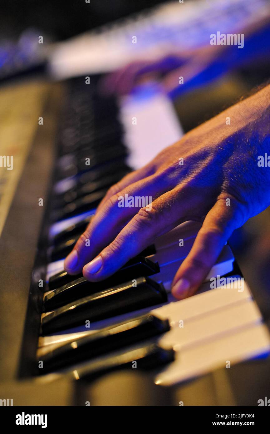Person playing piano rock concert hi-res stock photography and images ...