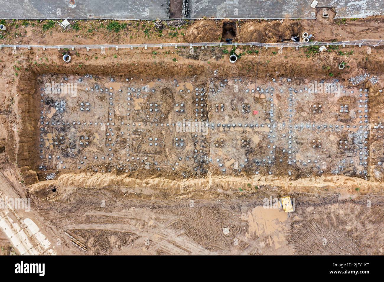 foundation pit. construction of an apartment house basement with ...