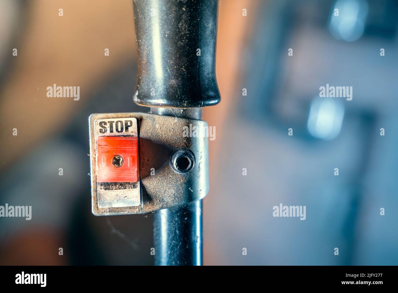 Switch on the handle with the inscription stop and a red switch close ...