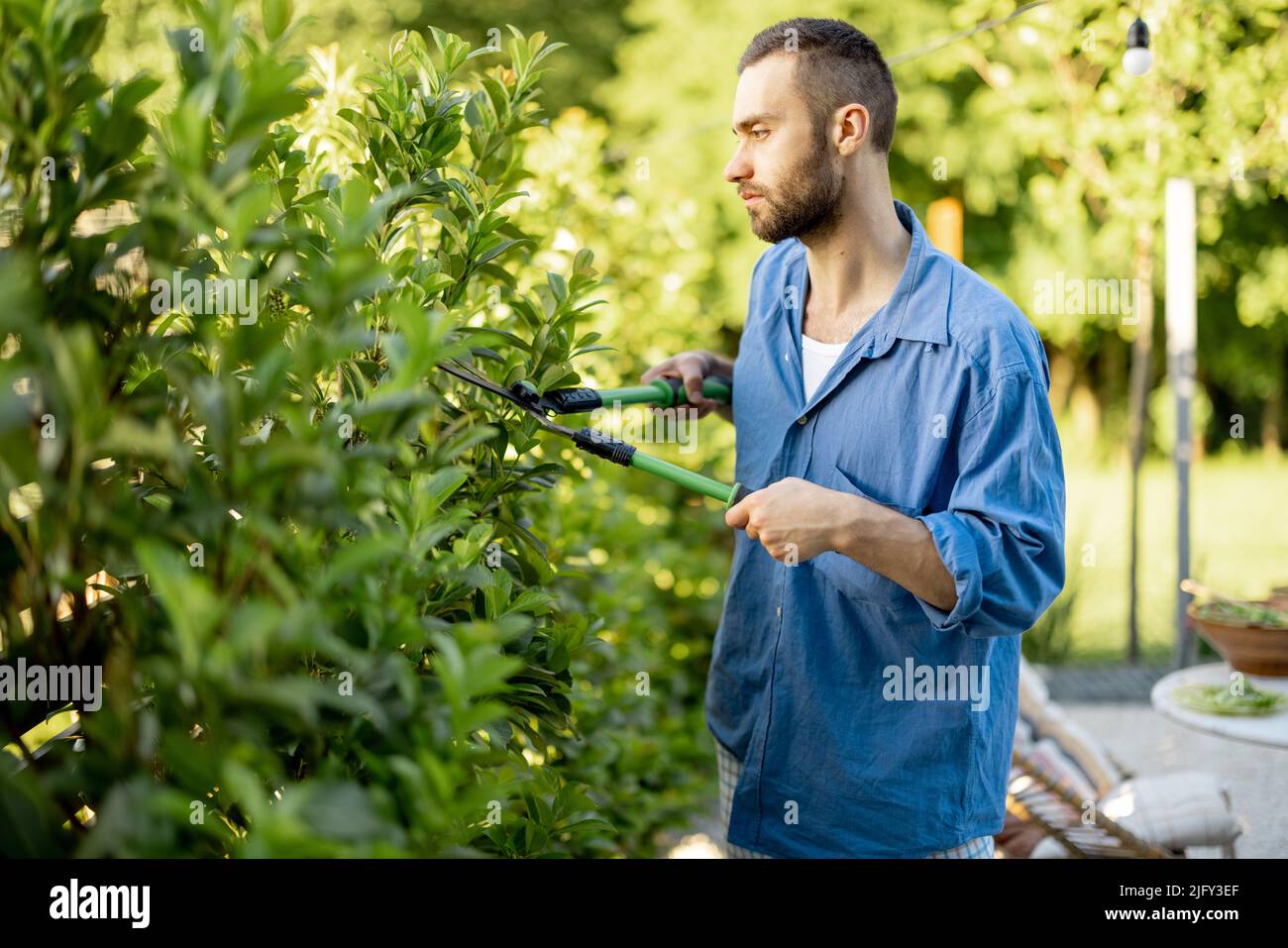 Portrait happy gardener tool hi-res stock photography and images - Alamy