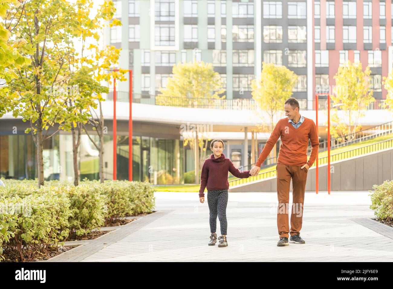 Happy father with daughter in fall season Stock Photo - Alamy