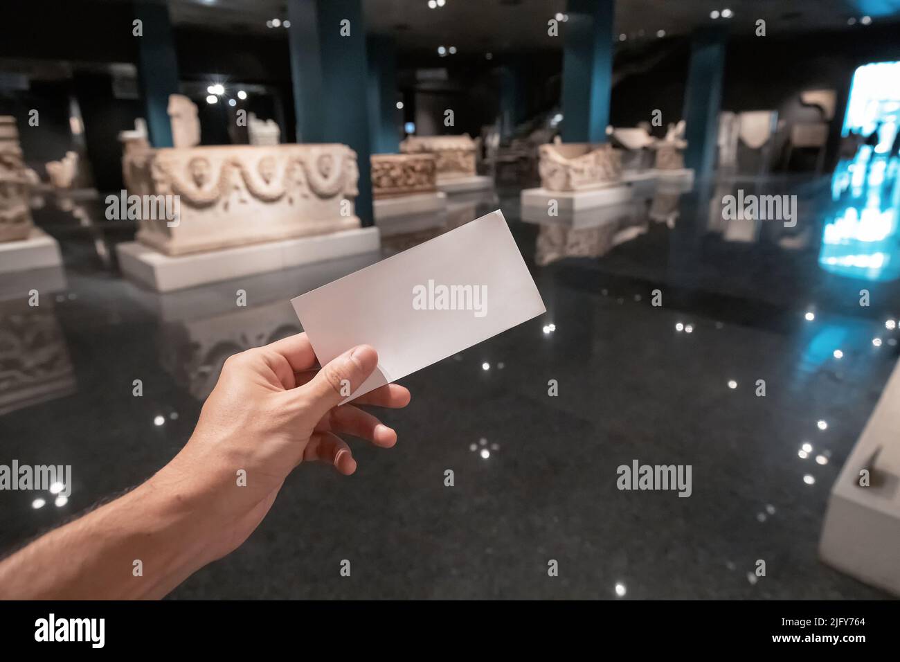 Blank entrance ticket to the archaeological museum against the ...