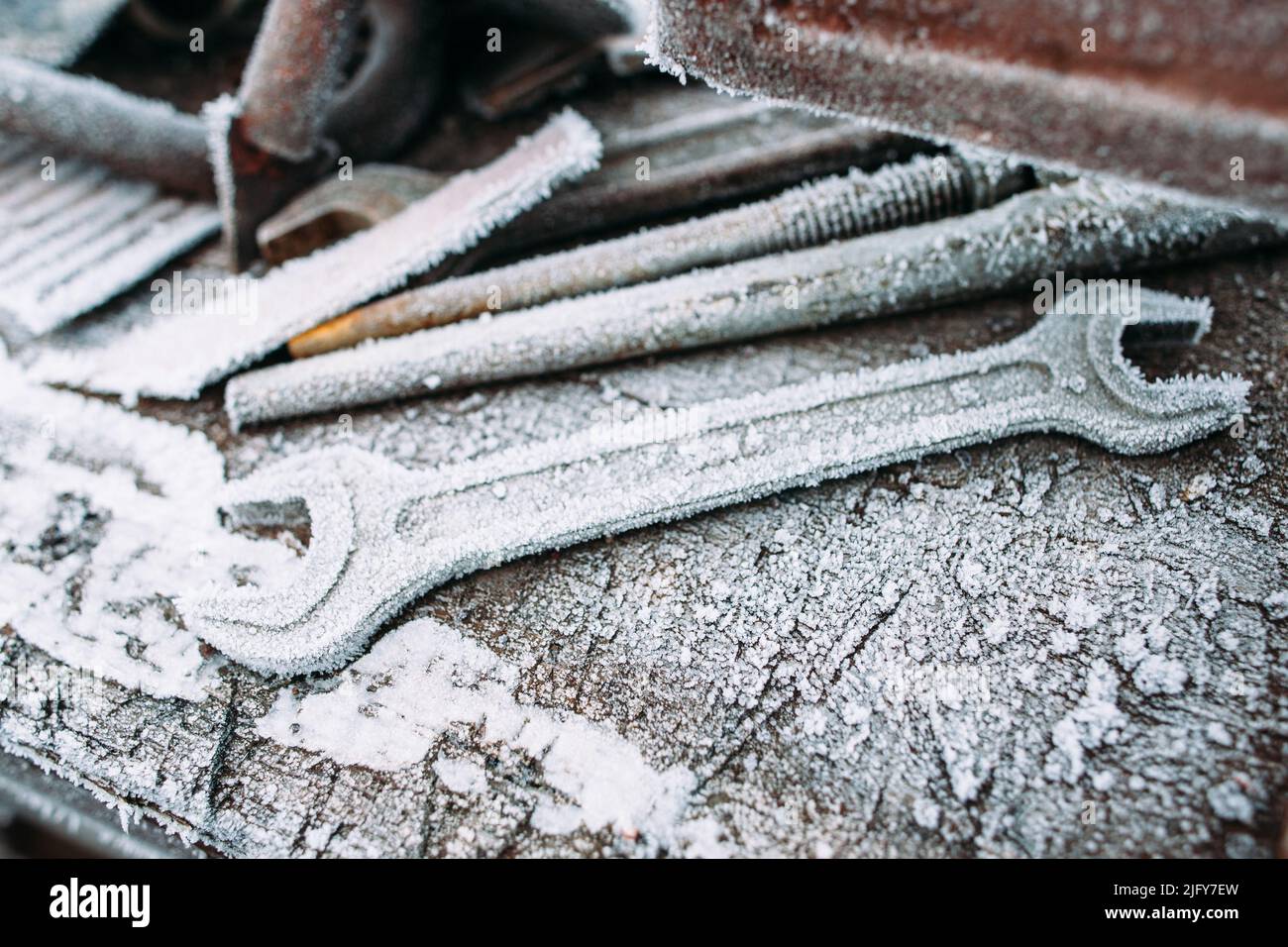 frosted wrenches tools winter cold temperature Stock Photo - Alamy