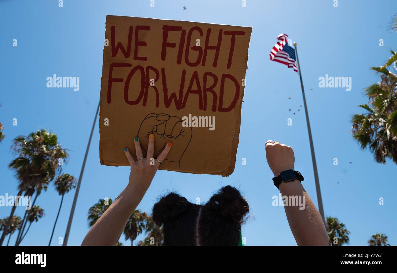 Sixth Street Viaduct, California, USA. 4th July, 2022. A sign is held ...