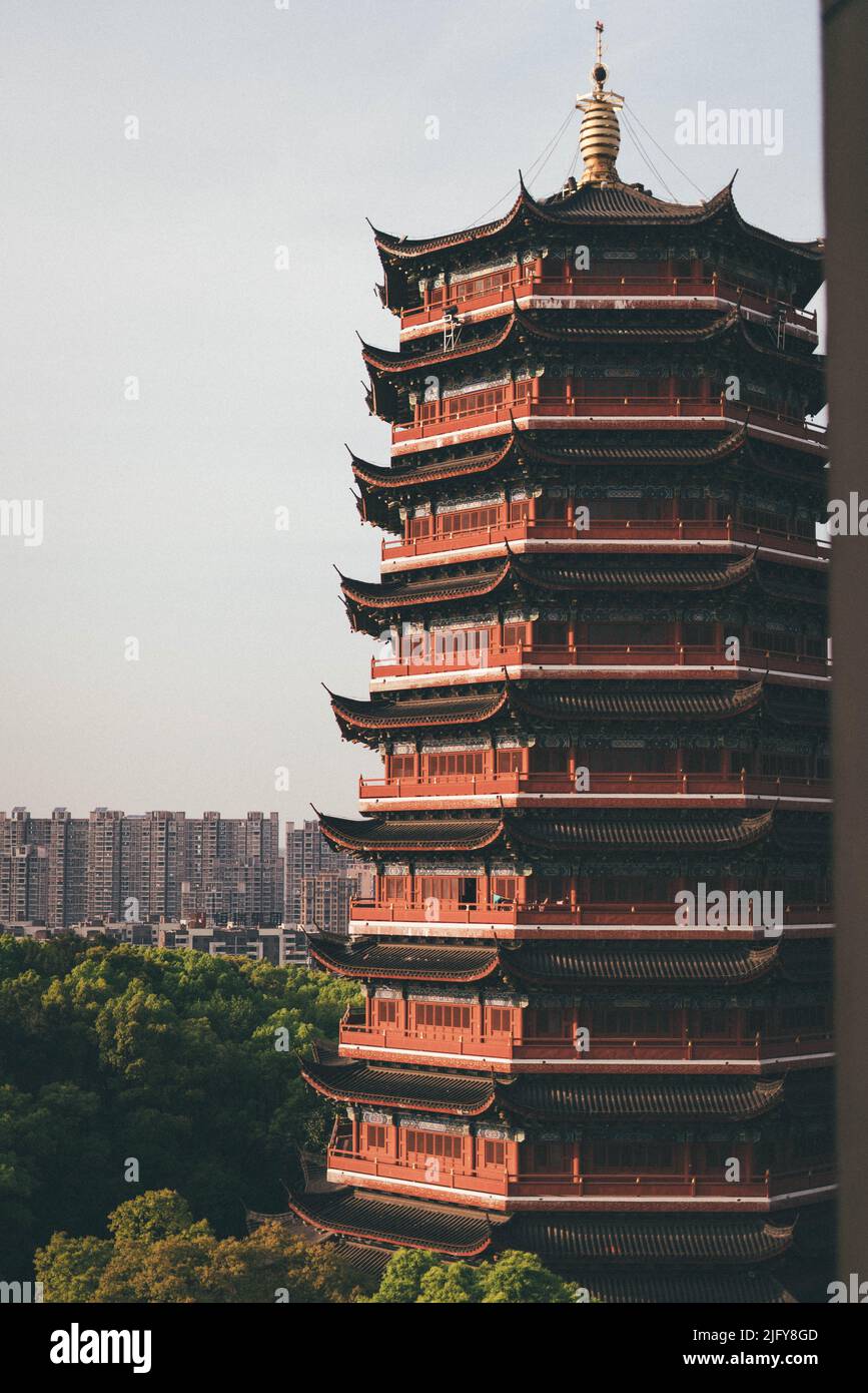 A vertical shot of a traditional Chinese architectural style tower ...