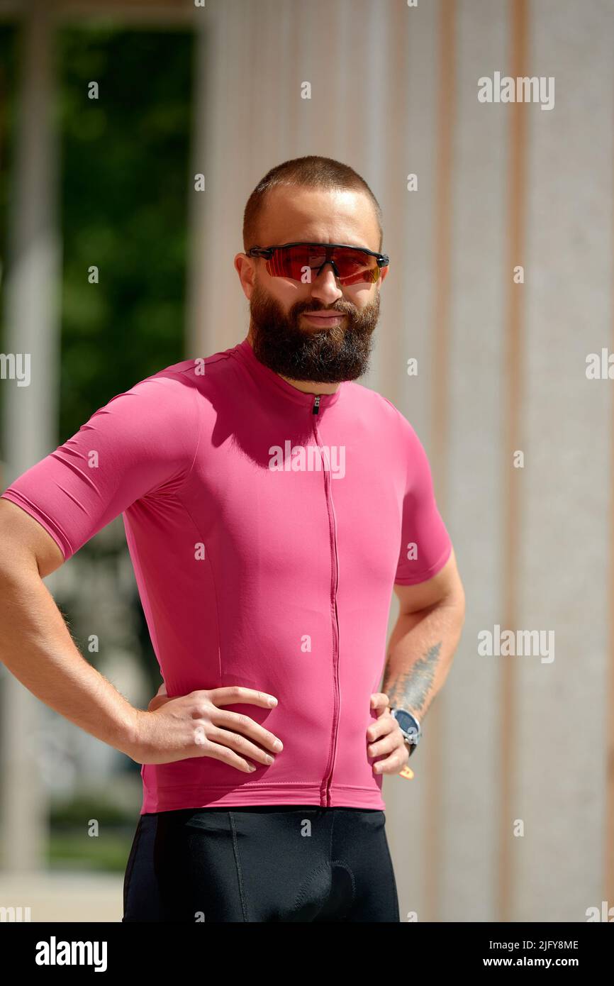 Portrait of a runner man take a rest after jogging while standing ...