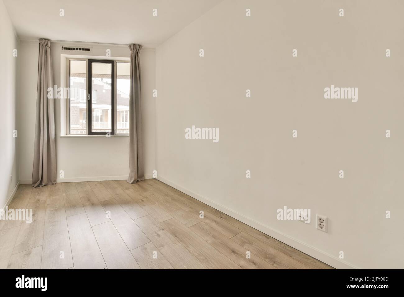A cozy and spacious empty room in a luxury house Stock Photo - Alamy