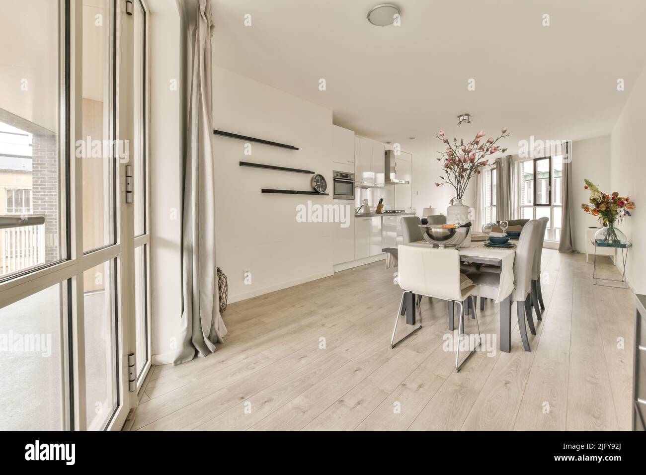 Spacious bright kitchen with dining area, modern design and panoramic ...