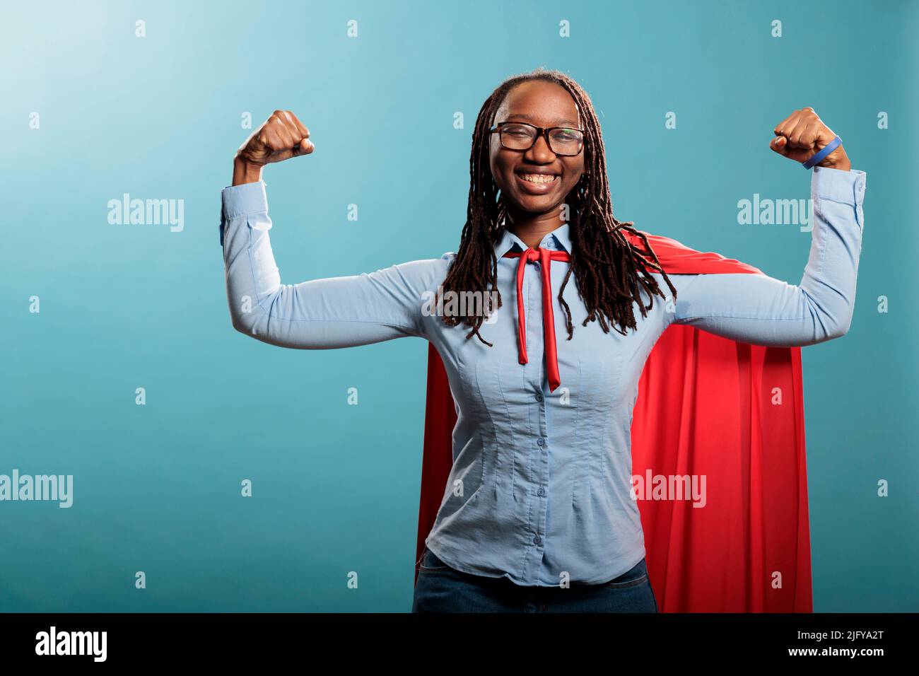 Black woman standing proud pose hi-res stock photography and images - Alamy