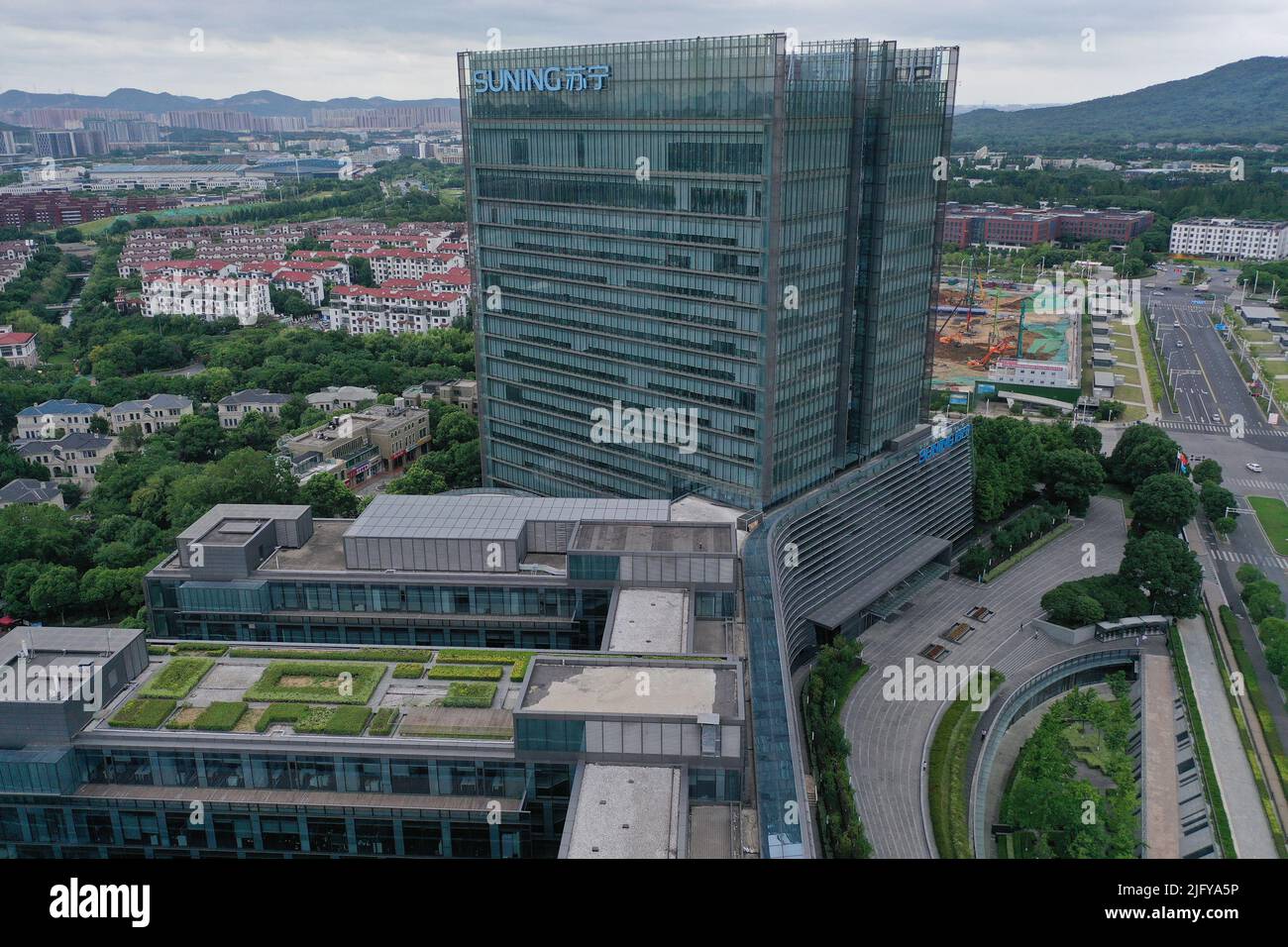 NANJING, CHINA - JULY 6, 2022 - The headquarters building of Suning ...