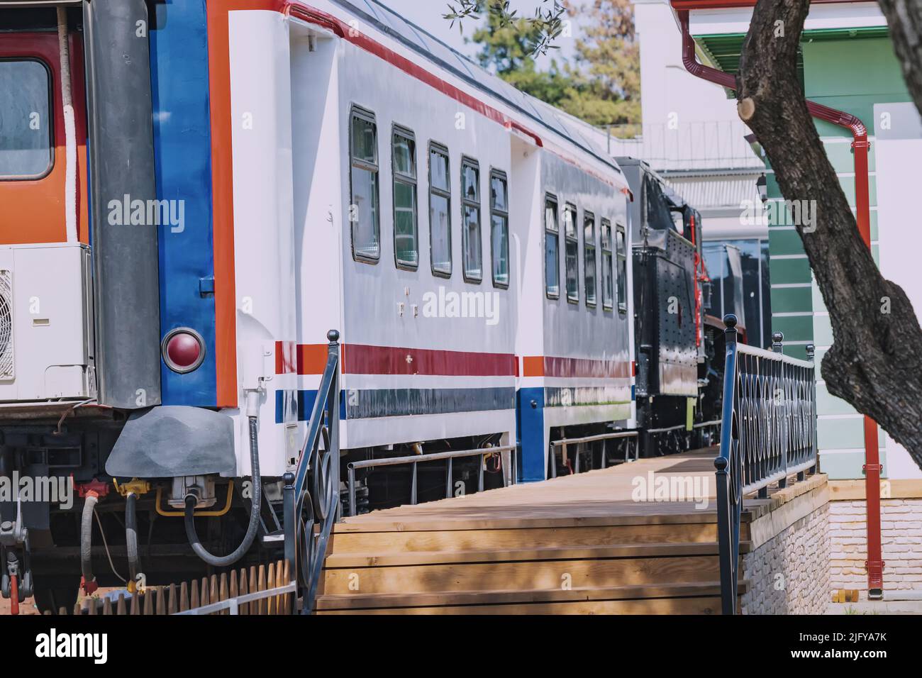 A retro tourist carriage of a Turkish train on the station platform ...