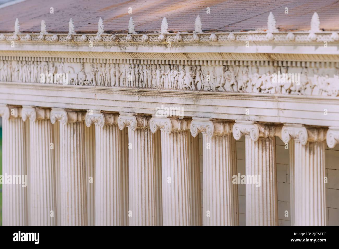 A smooth and rhythmic row of classical Greek columns in the ancient ...