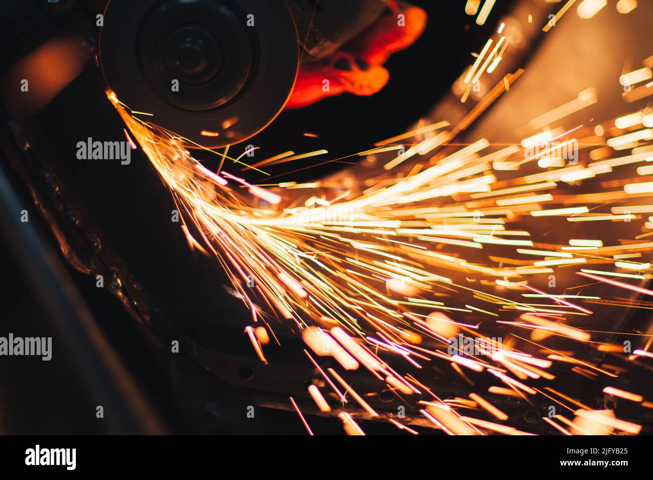 Angel grinder make a flash sparks Stock Photo - Alamy