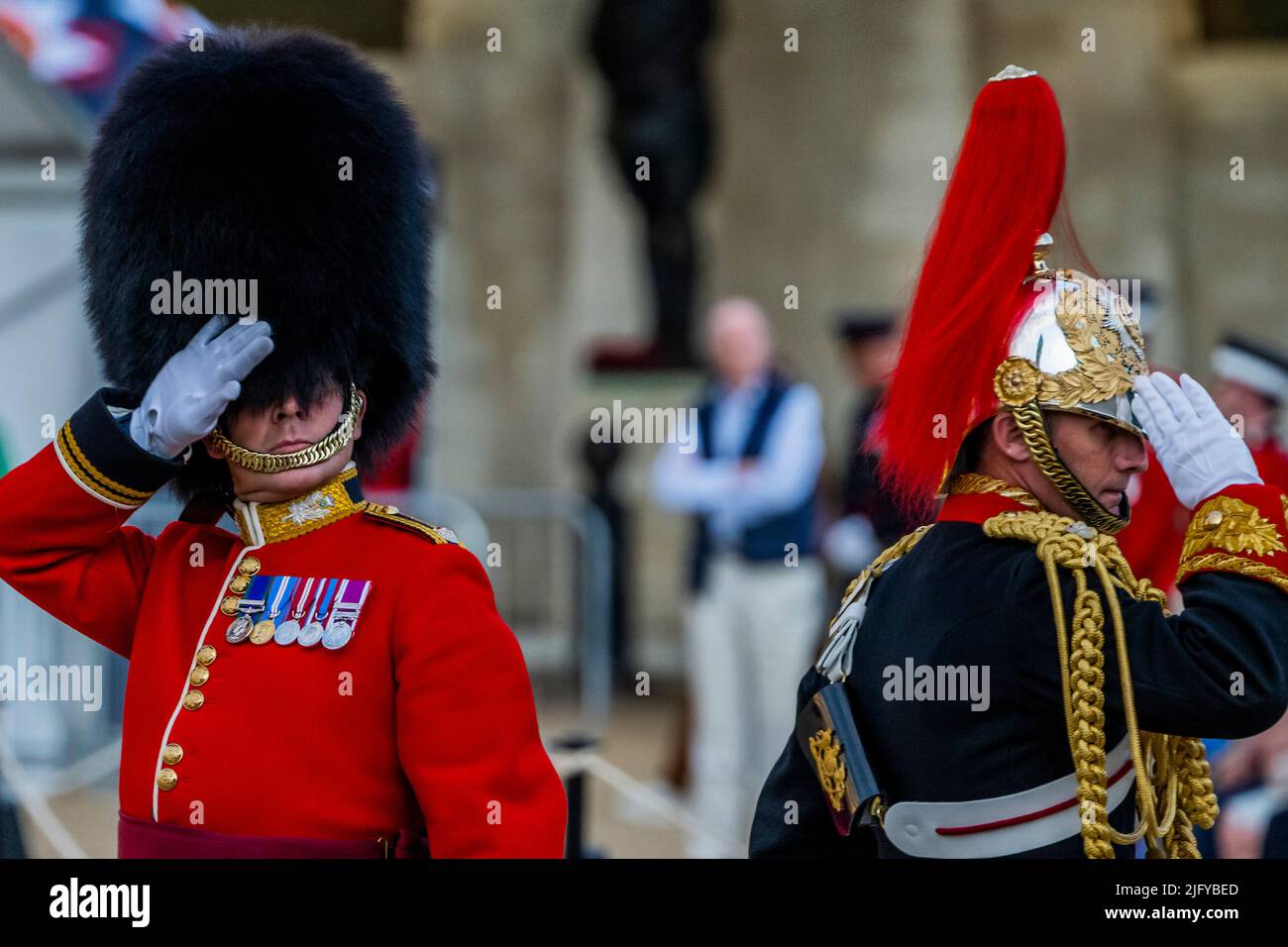 London, UK. 5th July, 2022. Conductors swap and salute the General ...