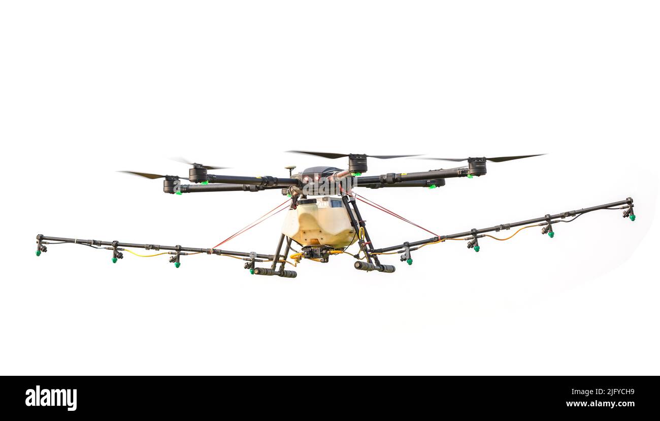 Big agriculture drone flying over the rice field to sprayed chemical or ...