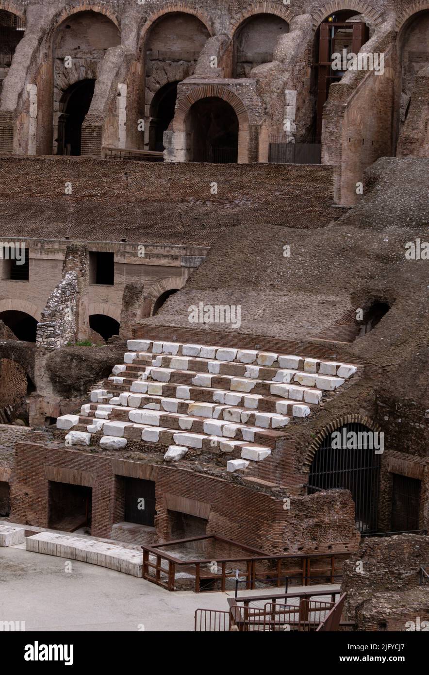 Rome, Italy, March 2022. Marble seats from the Colosseum's tribune ...