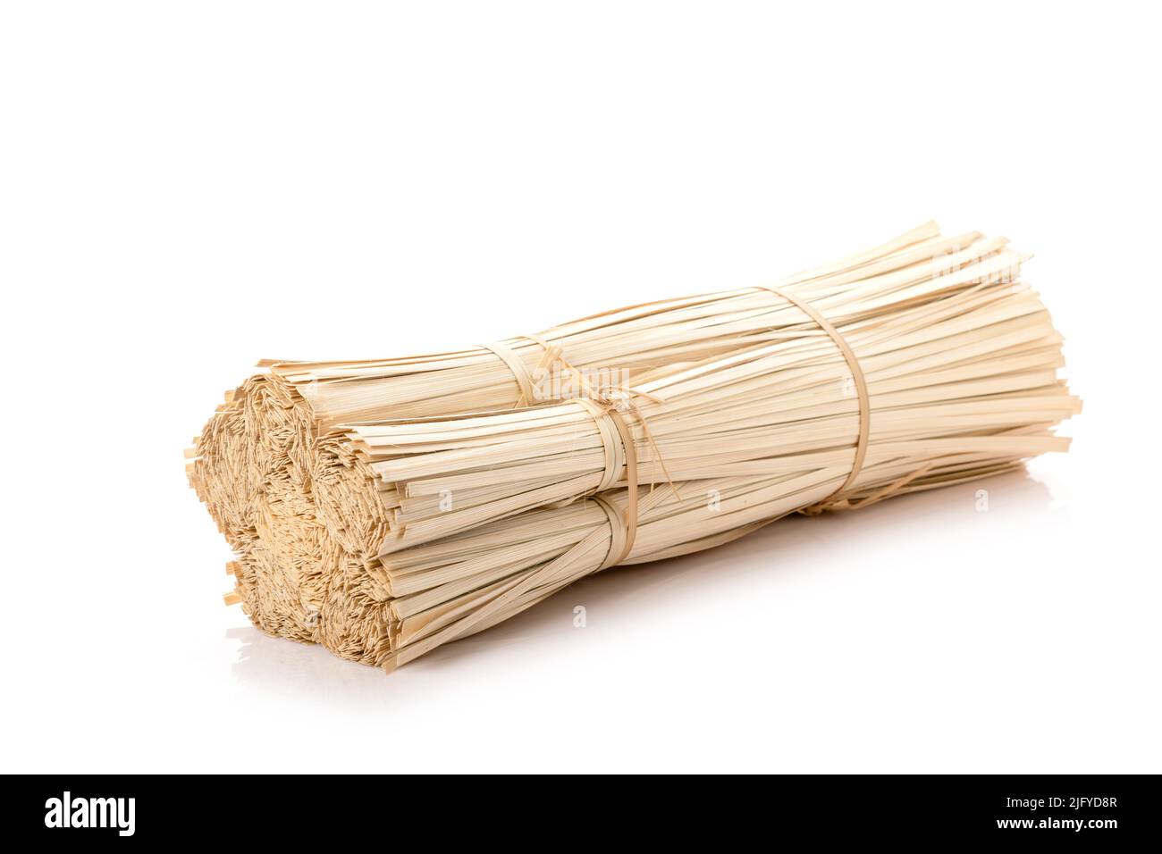 Bundle of thin bamboo-stripes use like rope isolated on white ...