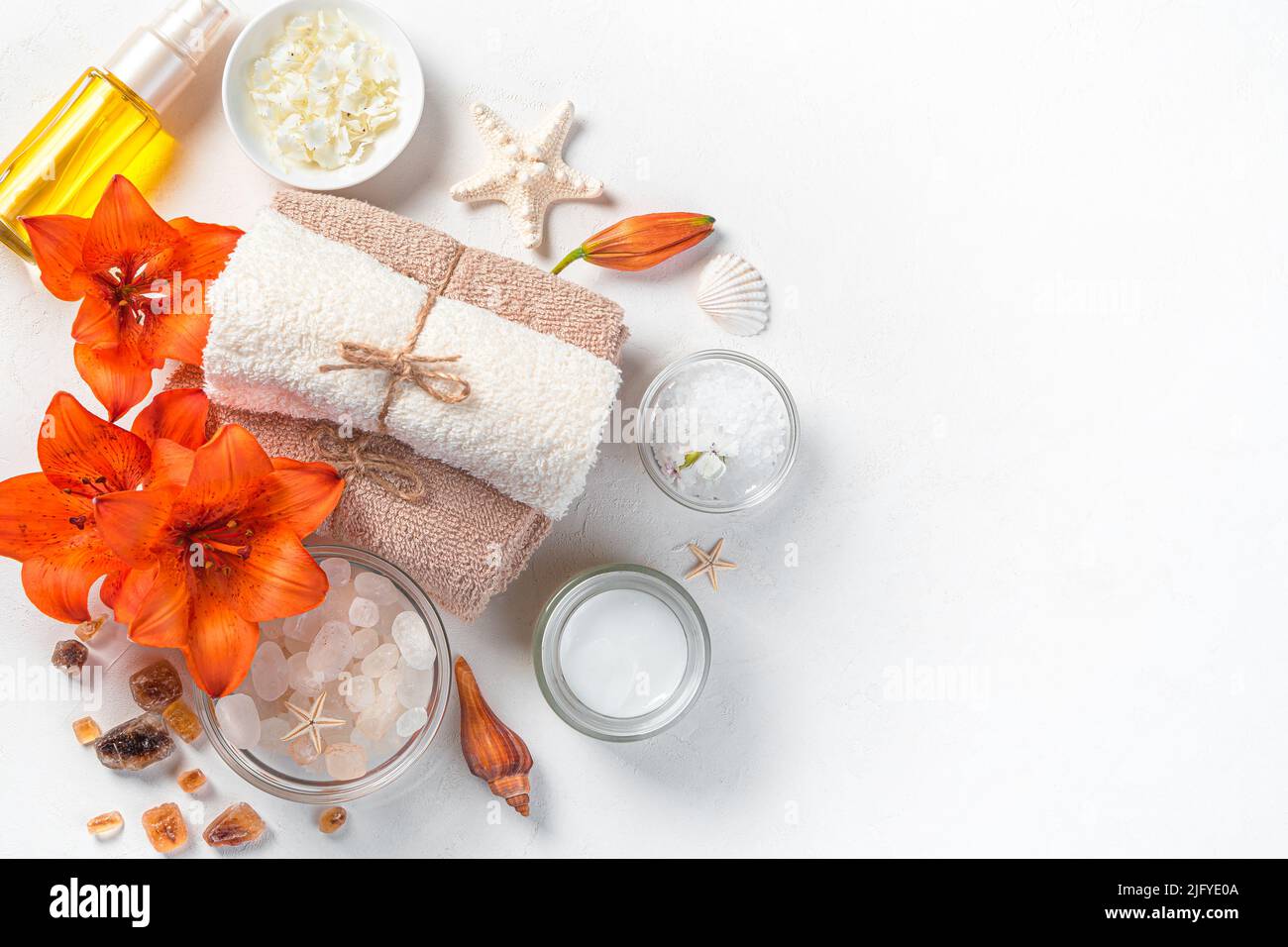 Spa composition with natural cosmetics and fresh flowers for body care ...
