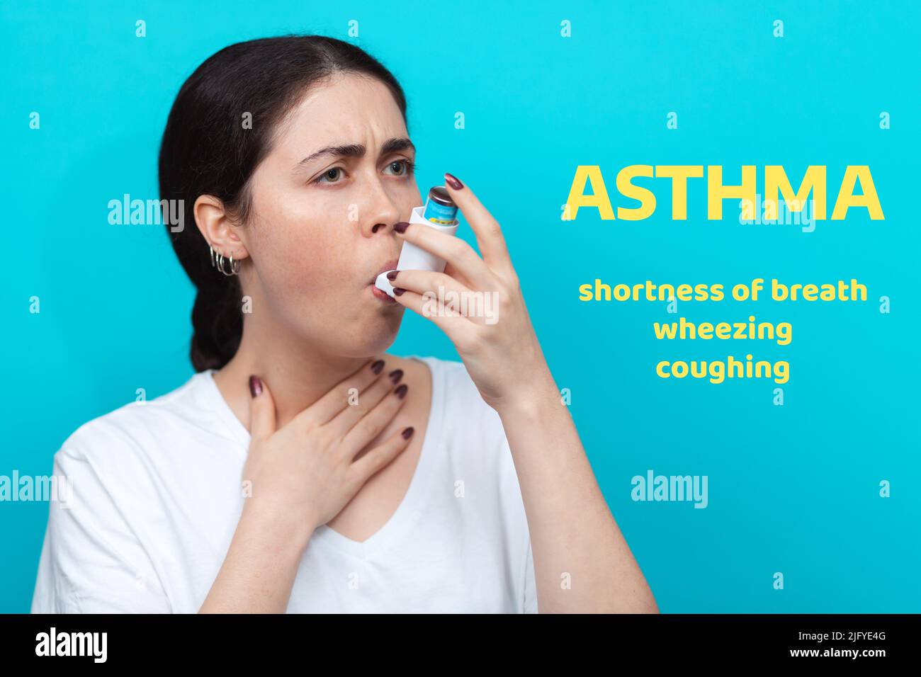 Portrait of a woman inhaling medication during an asthma attack. Blue ...